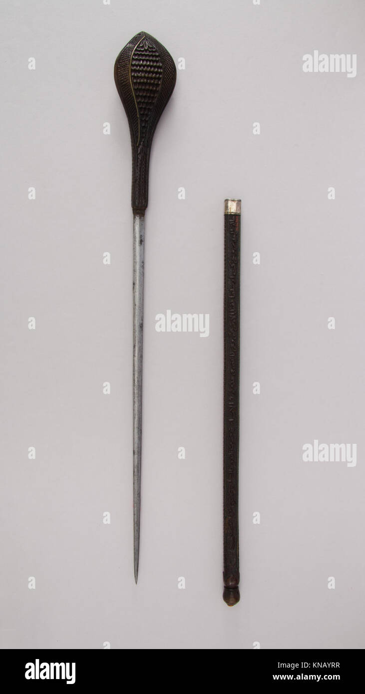 This dagger, complete with a sheath, showcases the blade and hilt ...