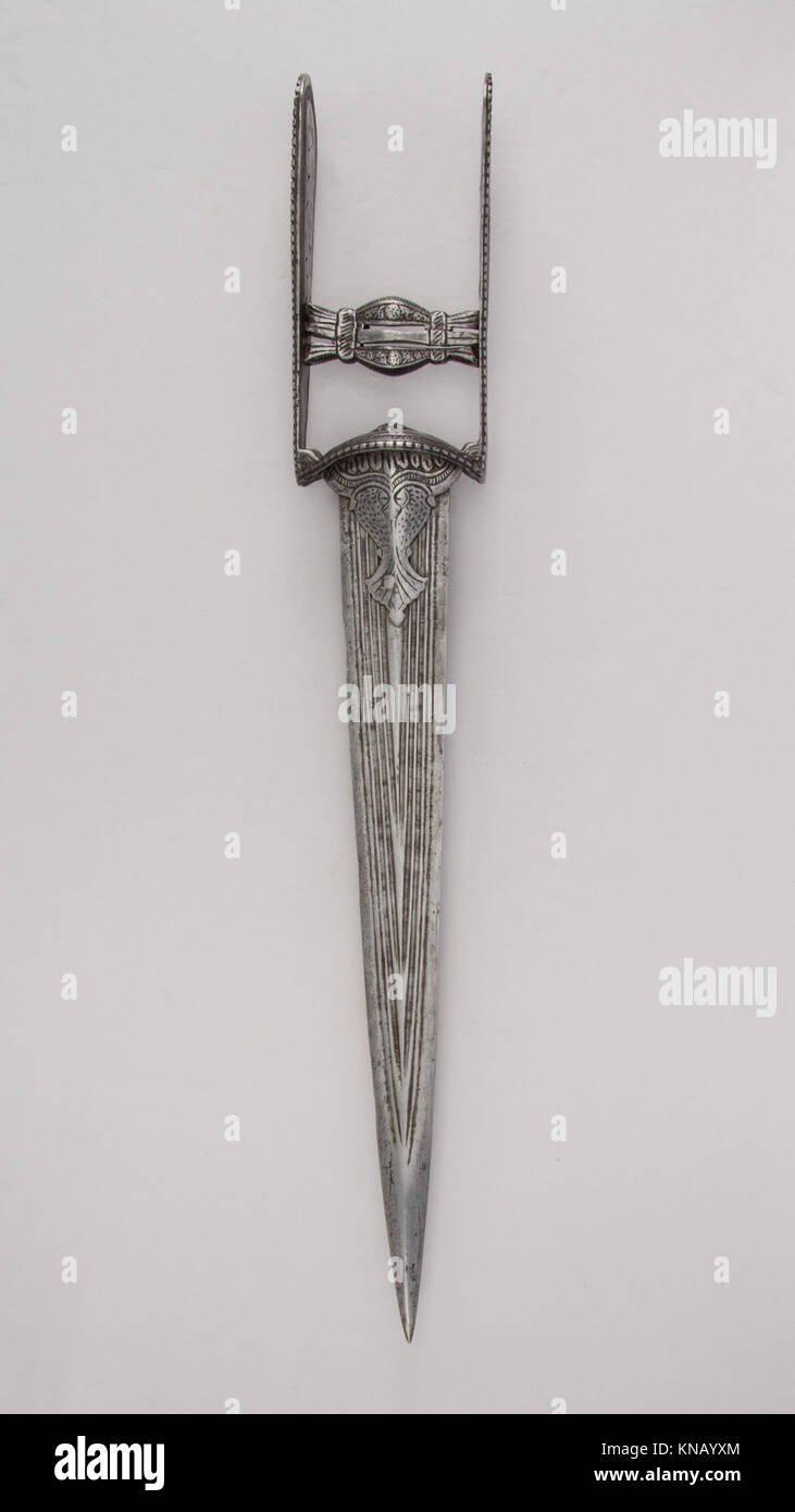 This South Asian Katar dagger shows a double-edged blade and distinct ...