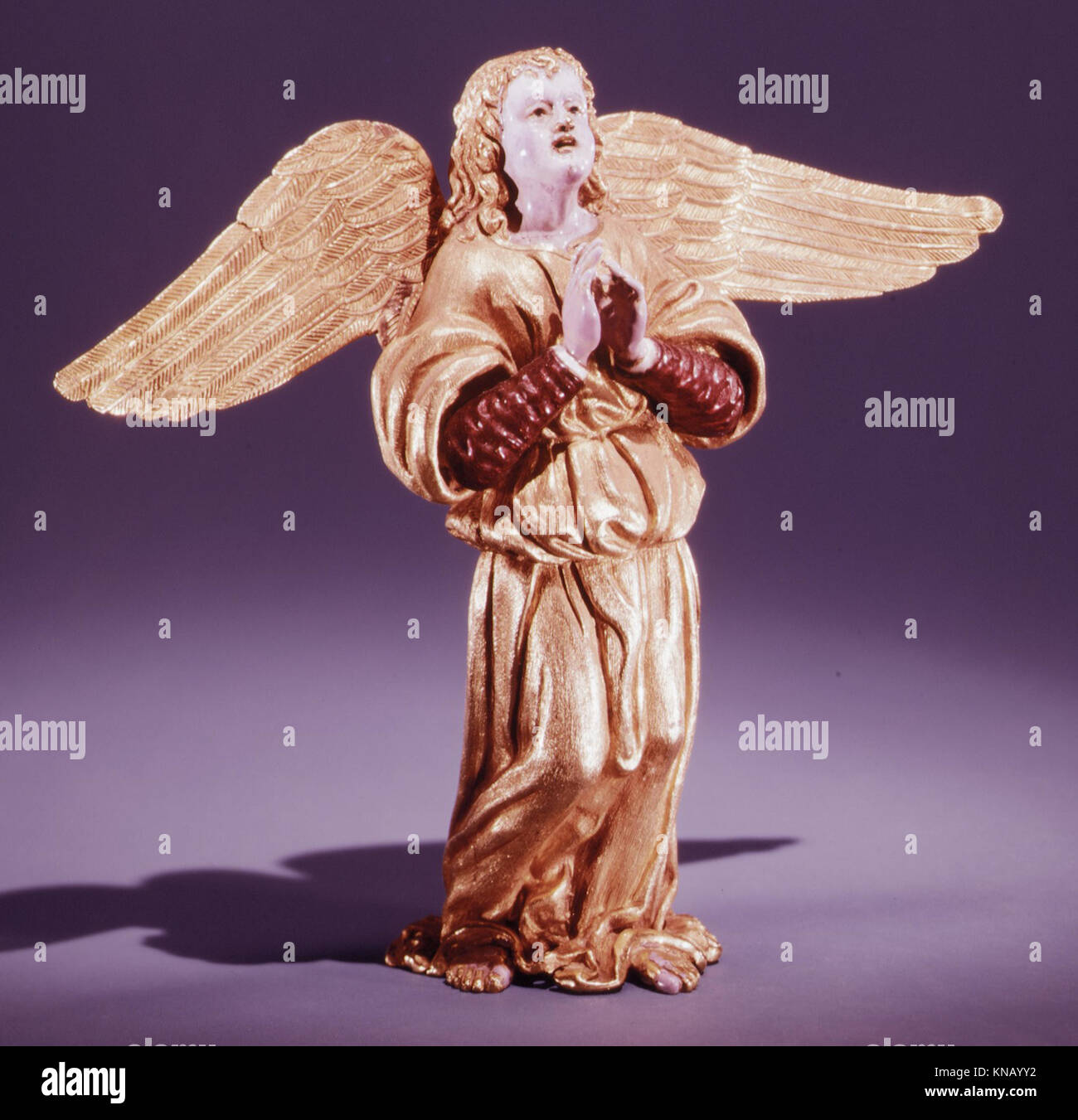 This depiction of an adoring angel is an example of religious ...