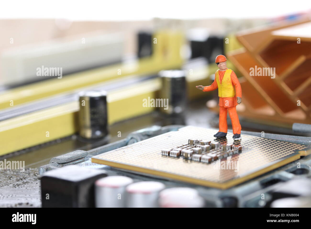 Miniature engineer or technician repairing CPU , Technology concept ...
