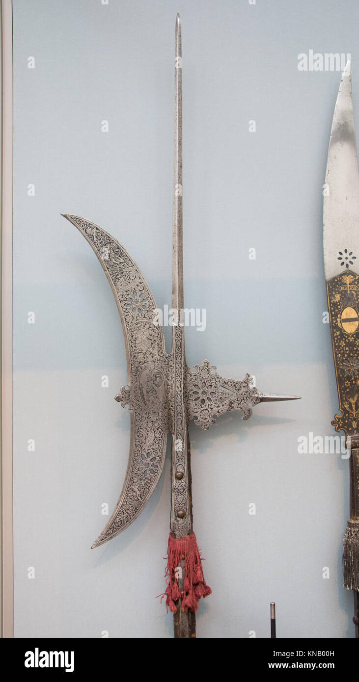 This halberd is a historical weapon used in combat. It showcases the ...