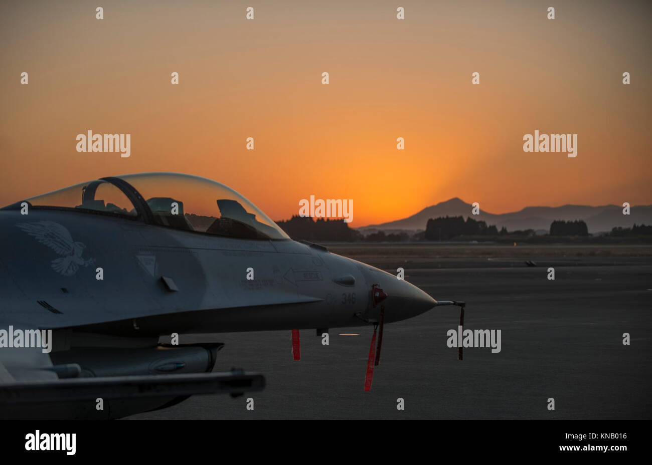 A U.S. Air Force F-16 Fighting Falcon sits on the runway at Japan Air ...