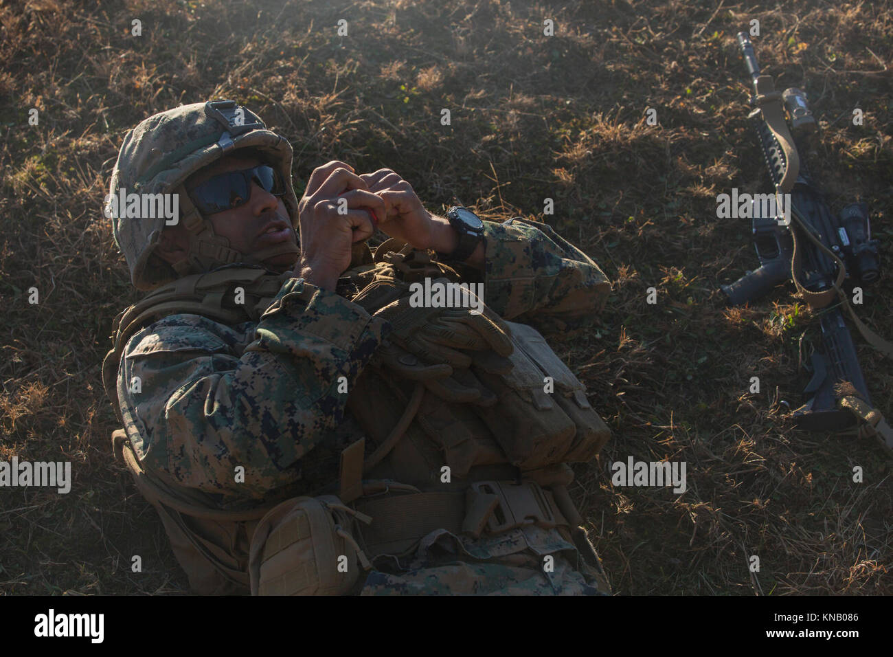 PFC Mohammad Ansari, a Marine with 2nd Battalion, 8th Marine Regiment, prepares an M69 training ...