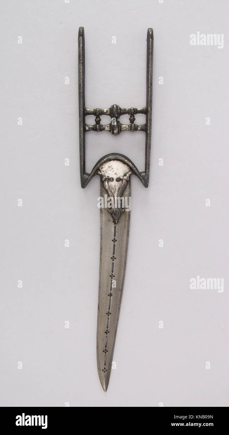 This katar, a type of Indian dagger, features a unique T-shaped hilt ...