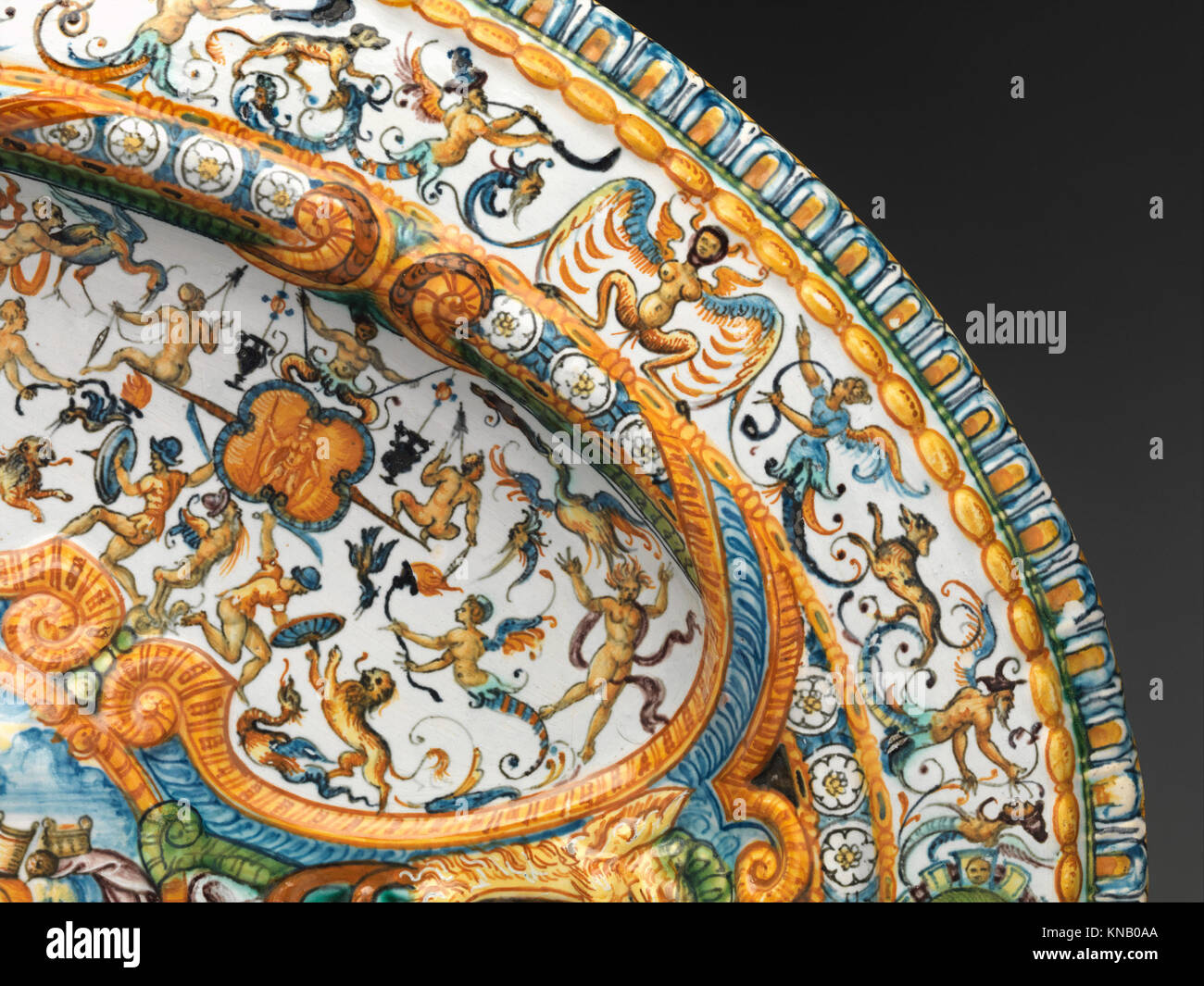 This basin or dish depicts the biblical scene of the Gathering of Manna ...