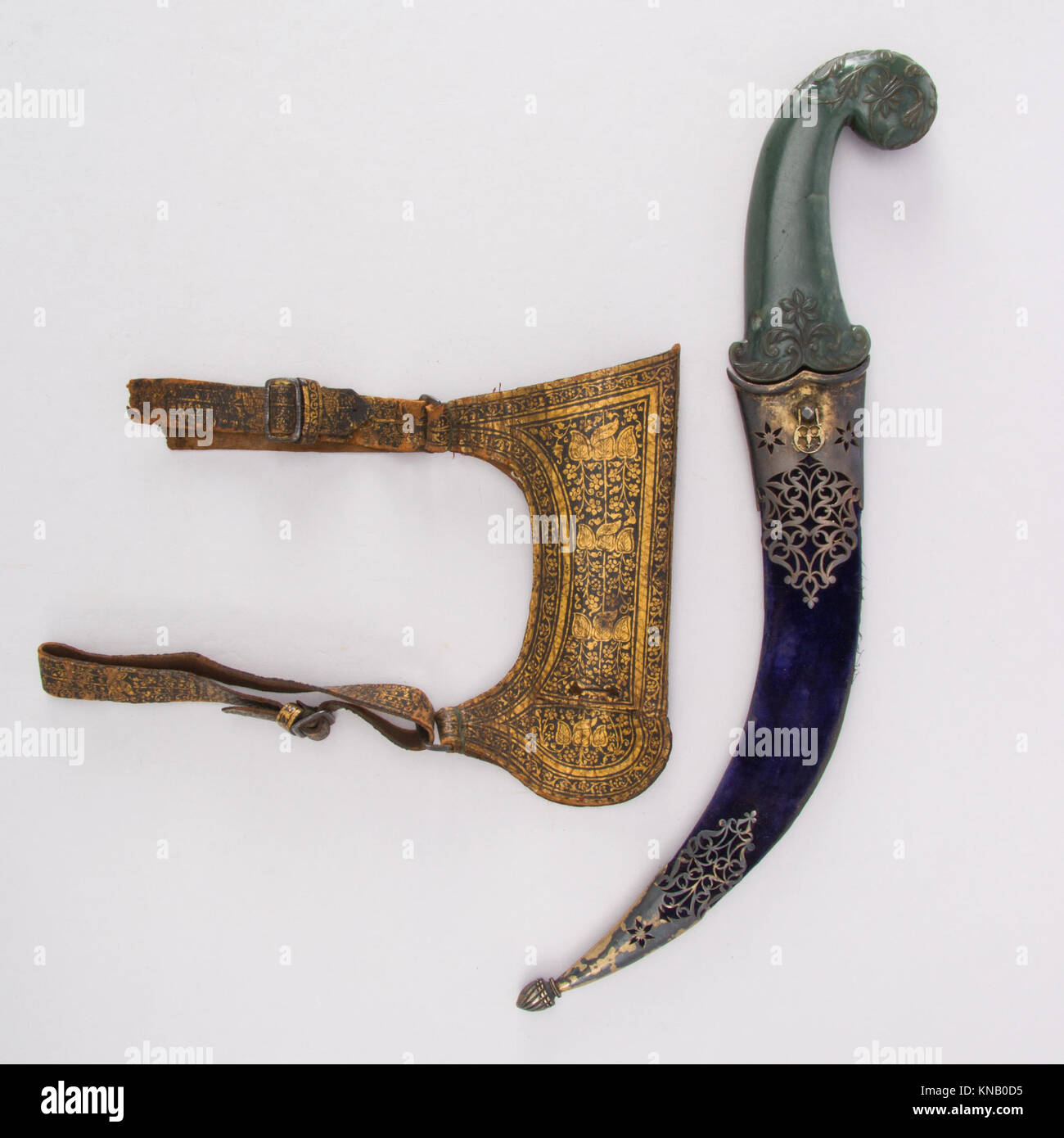 This Jambiya dagger with sheath and carrier illustrates Middle Eastern ...