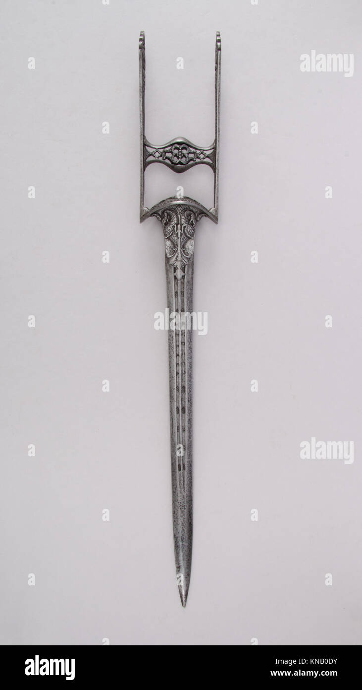 A Katar dagger, a traditional South Asian weapon, known for its unique ...