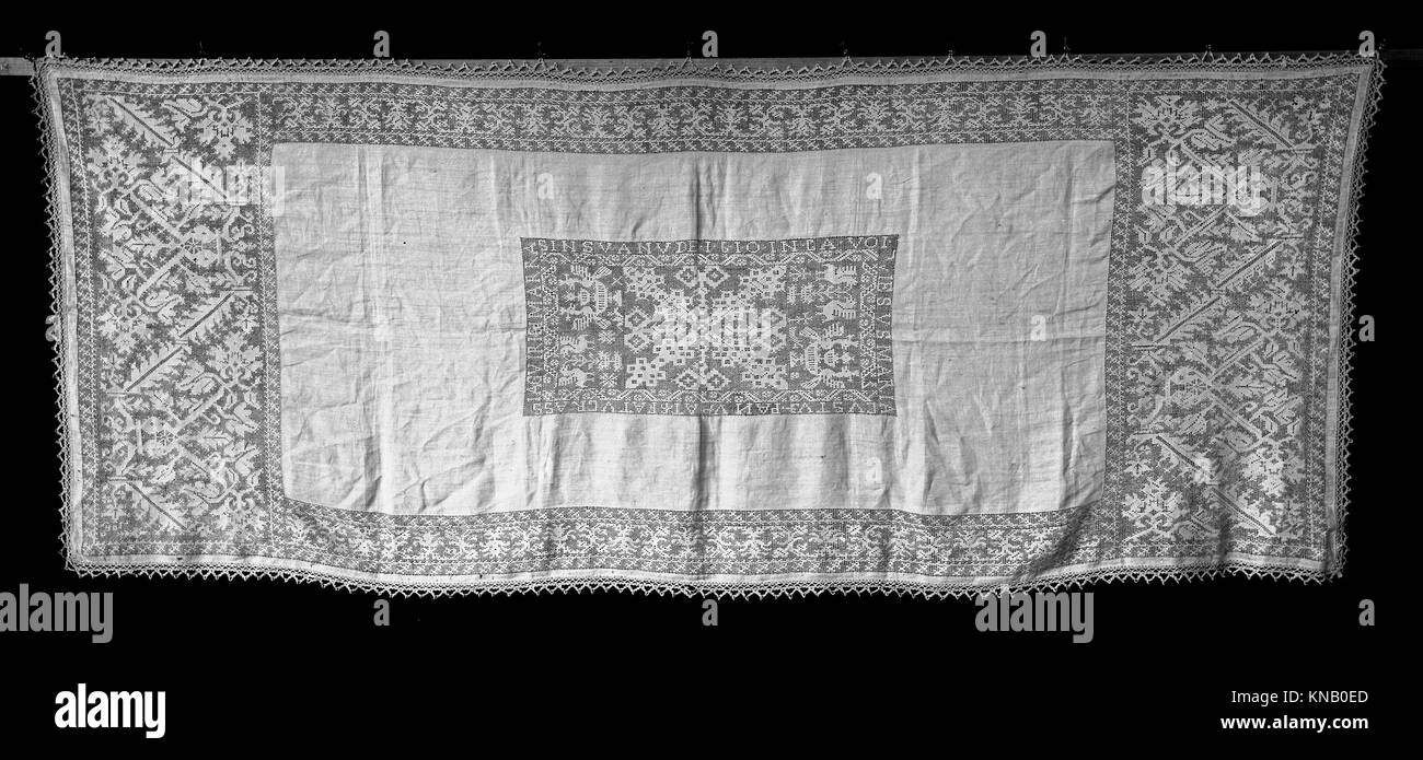 This altar cloth, likely used in religious rituals, features detailed ...