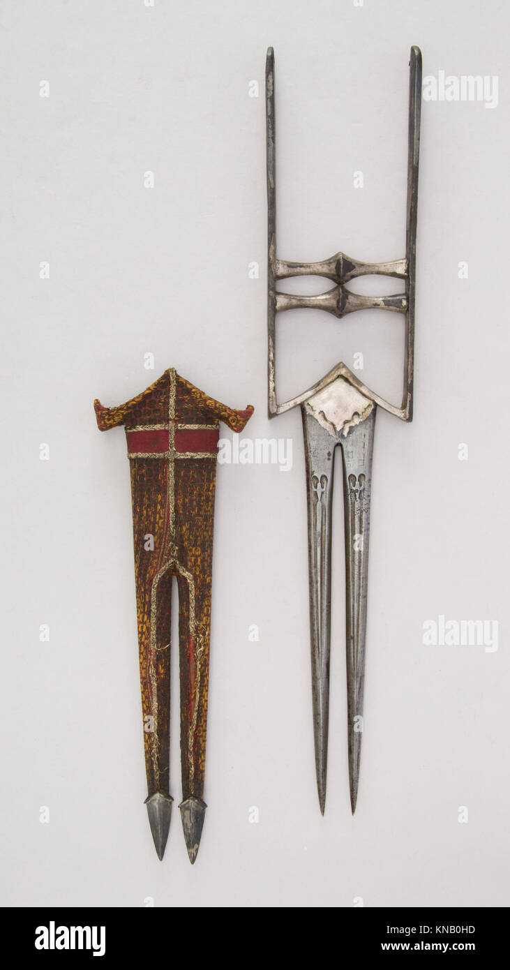 A katar dagger with a detailed sheath, originating from the Indian ...