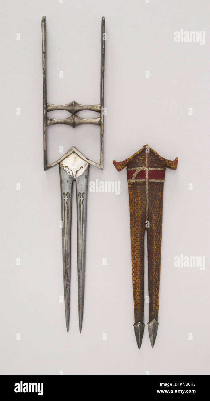 This dagger, known as a katar, comes with a matching sheath and ...
