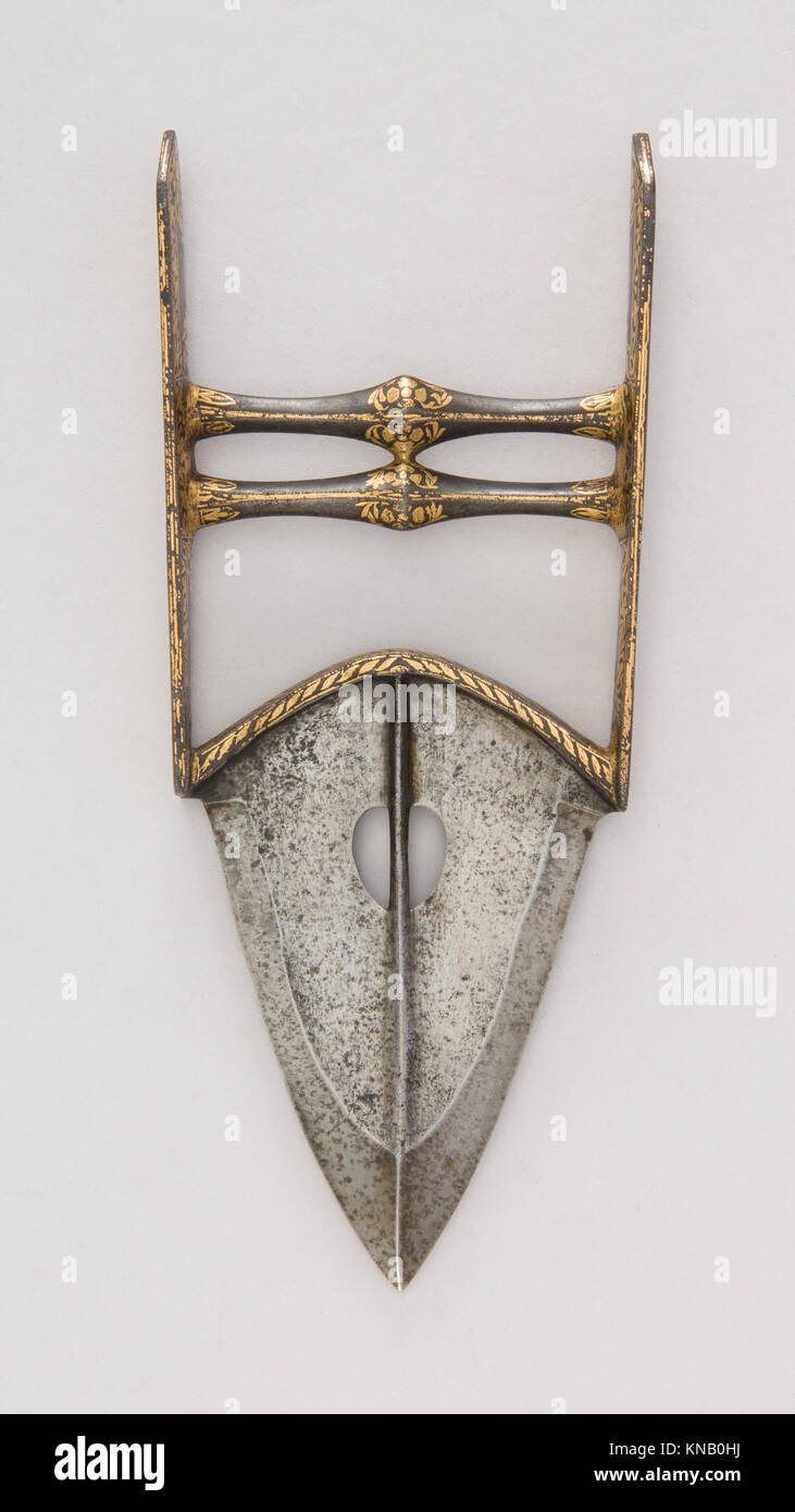 This katar dagger, originating from India, features a distinctive design with its unique hilt ...