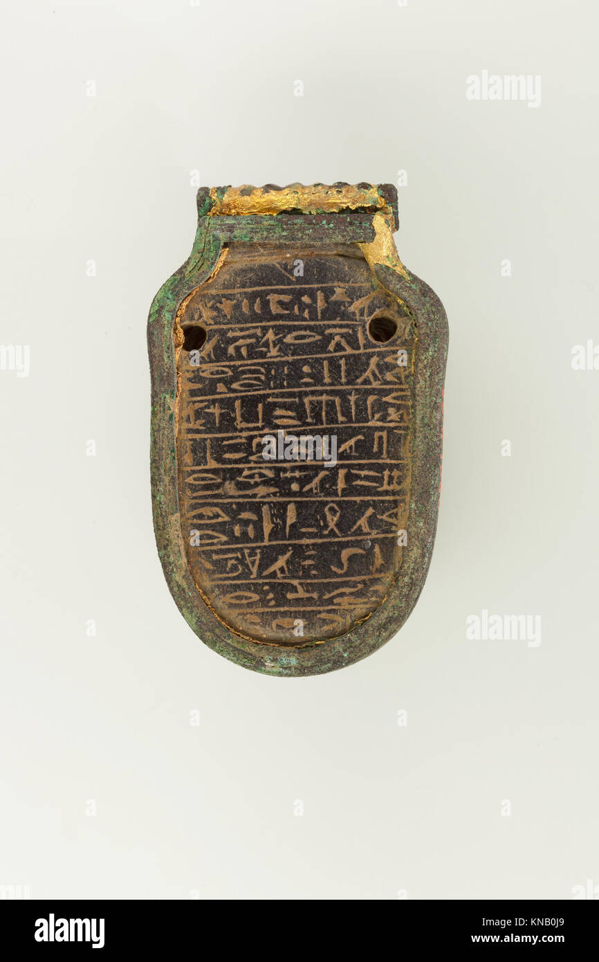The heart scarab with a human head is an Egyptian amulet used in ...