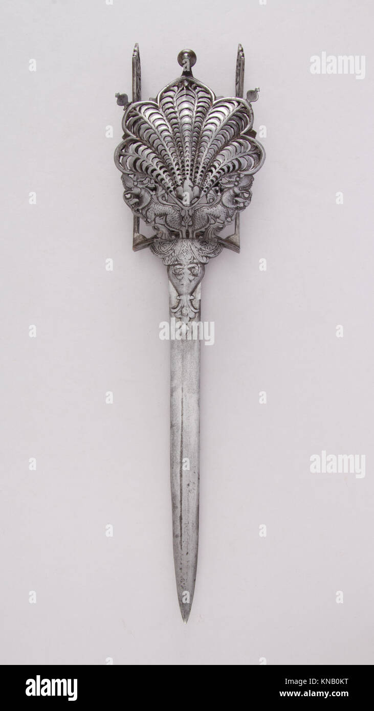 This katar, a distinctive Indian dagger, features a horizontal ...