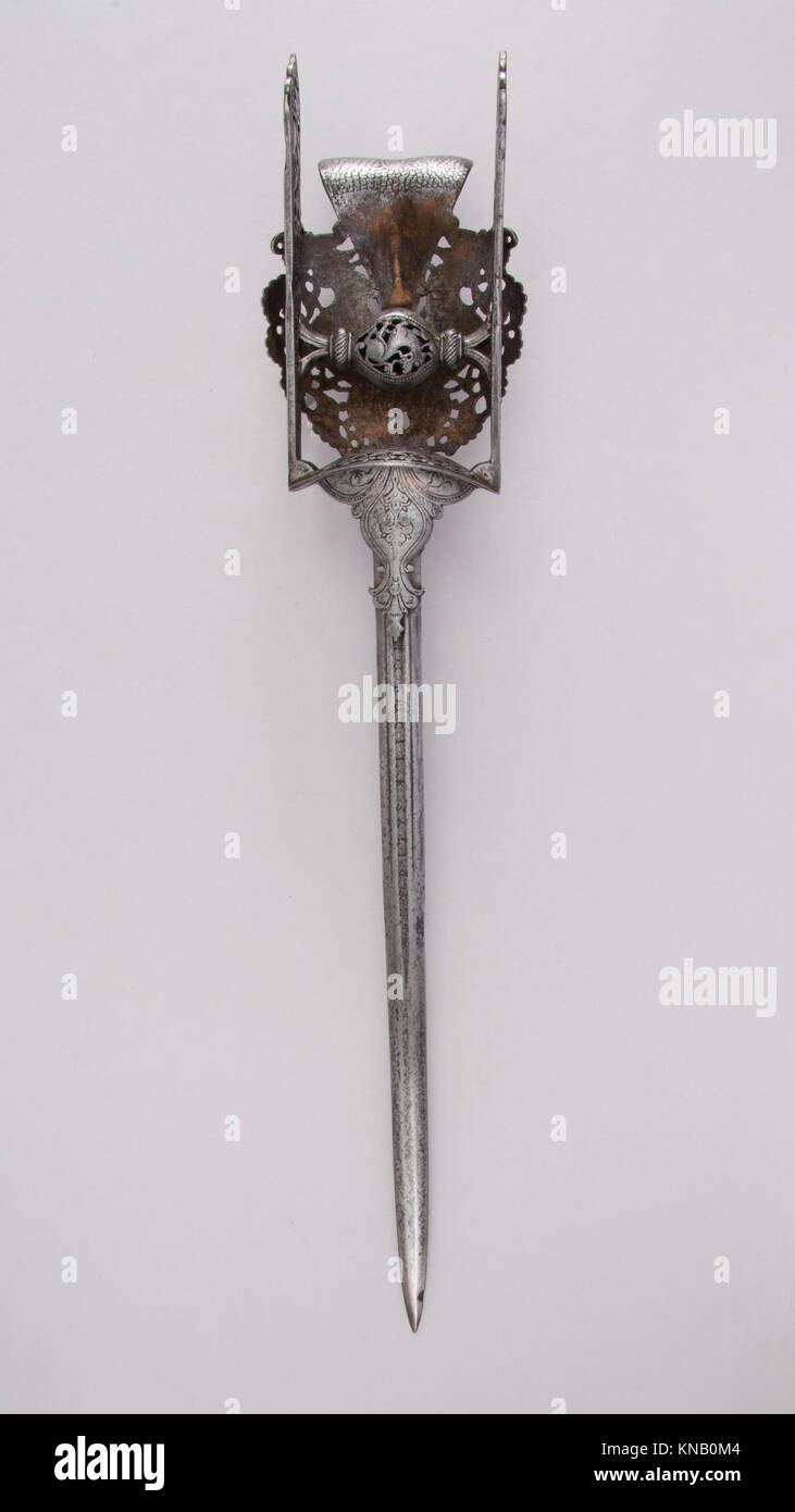 A South Asian guarded Katar dagger with intricate metalwork and ...