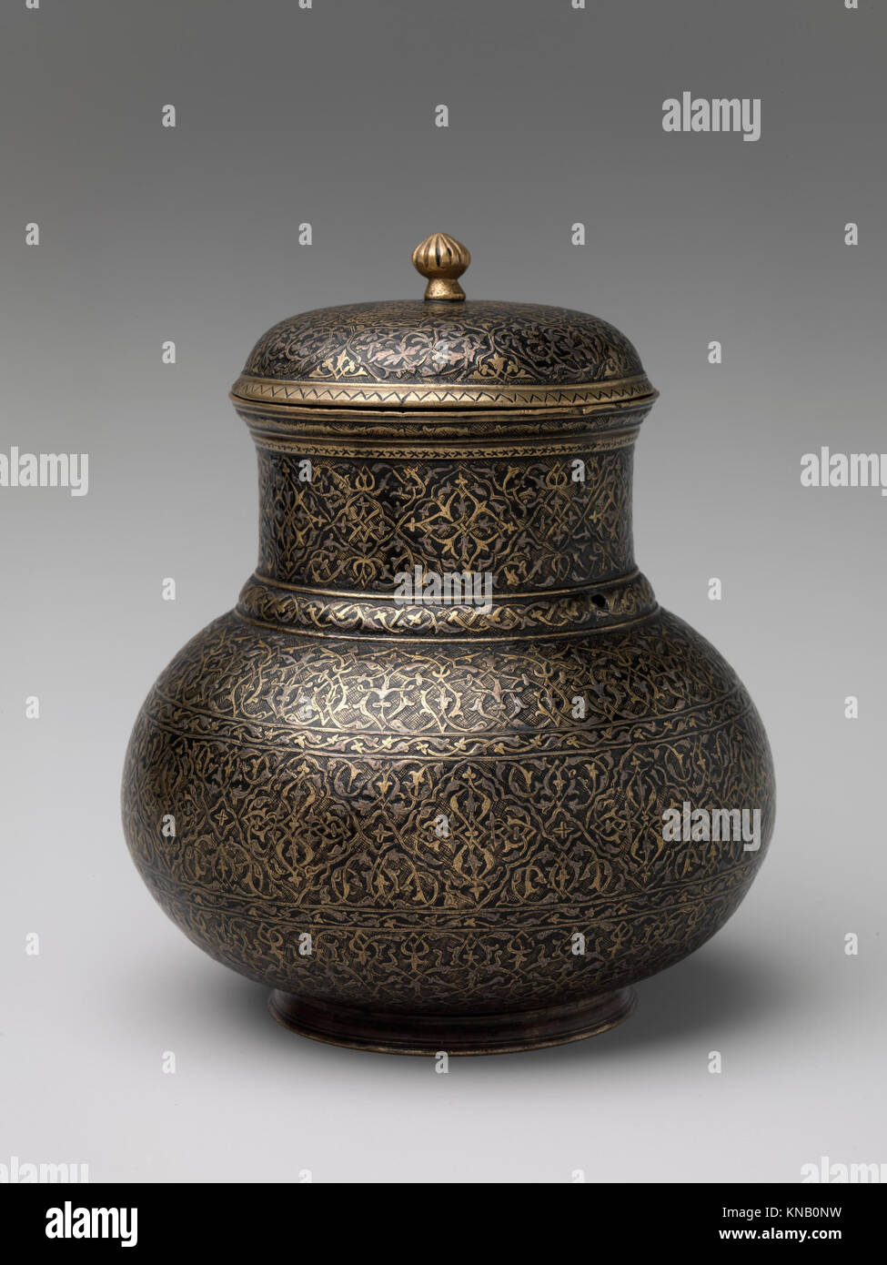 This ewer, complete with a lid, is an example of functional and ...