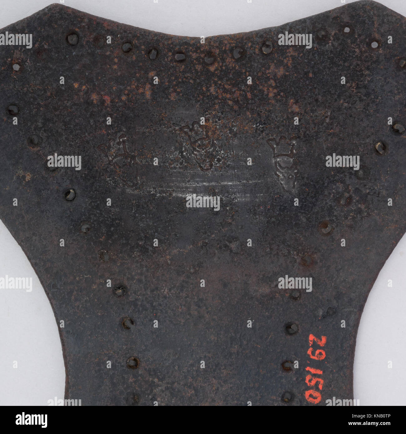 This brigandine plate, part of a historical armor set, showcases the ...