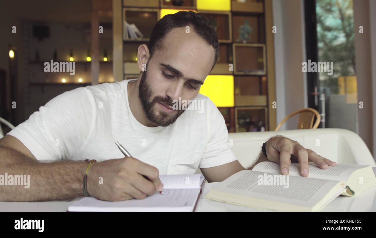 Man studying, preparing for exam Stock Photo - Alamy