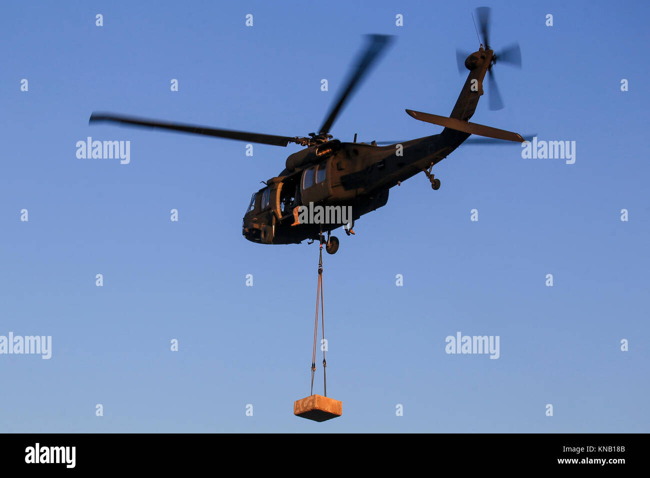 Uh 60 black hawk helicopter lifts hi-res stock photography and images ...