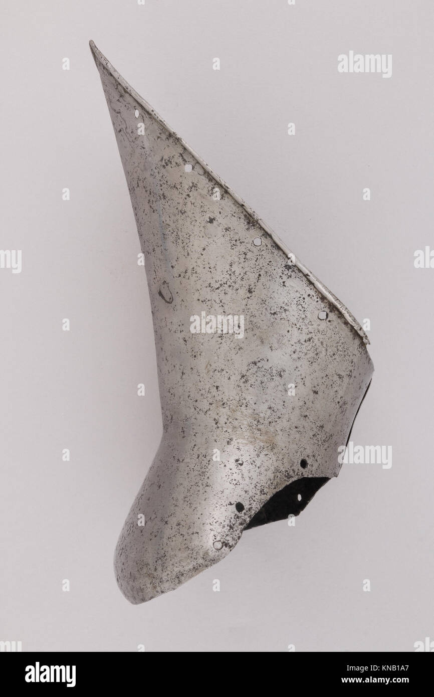 This cuff, part of a left gauntlet, represents medieval armor design ...