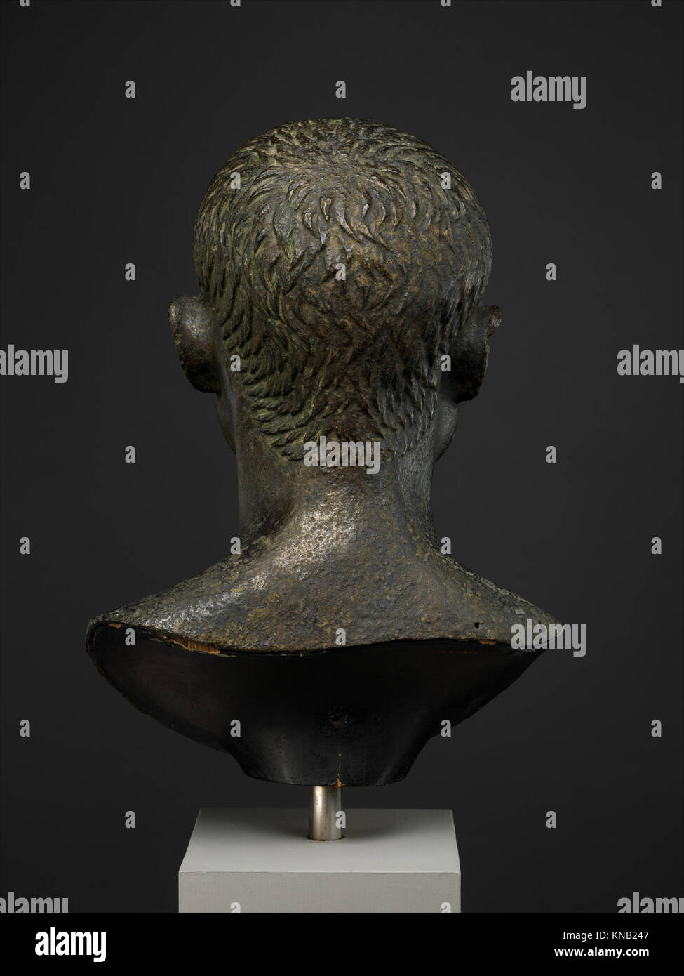 This bronze portrait bust represents a man, highlighting realistic ...