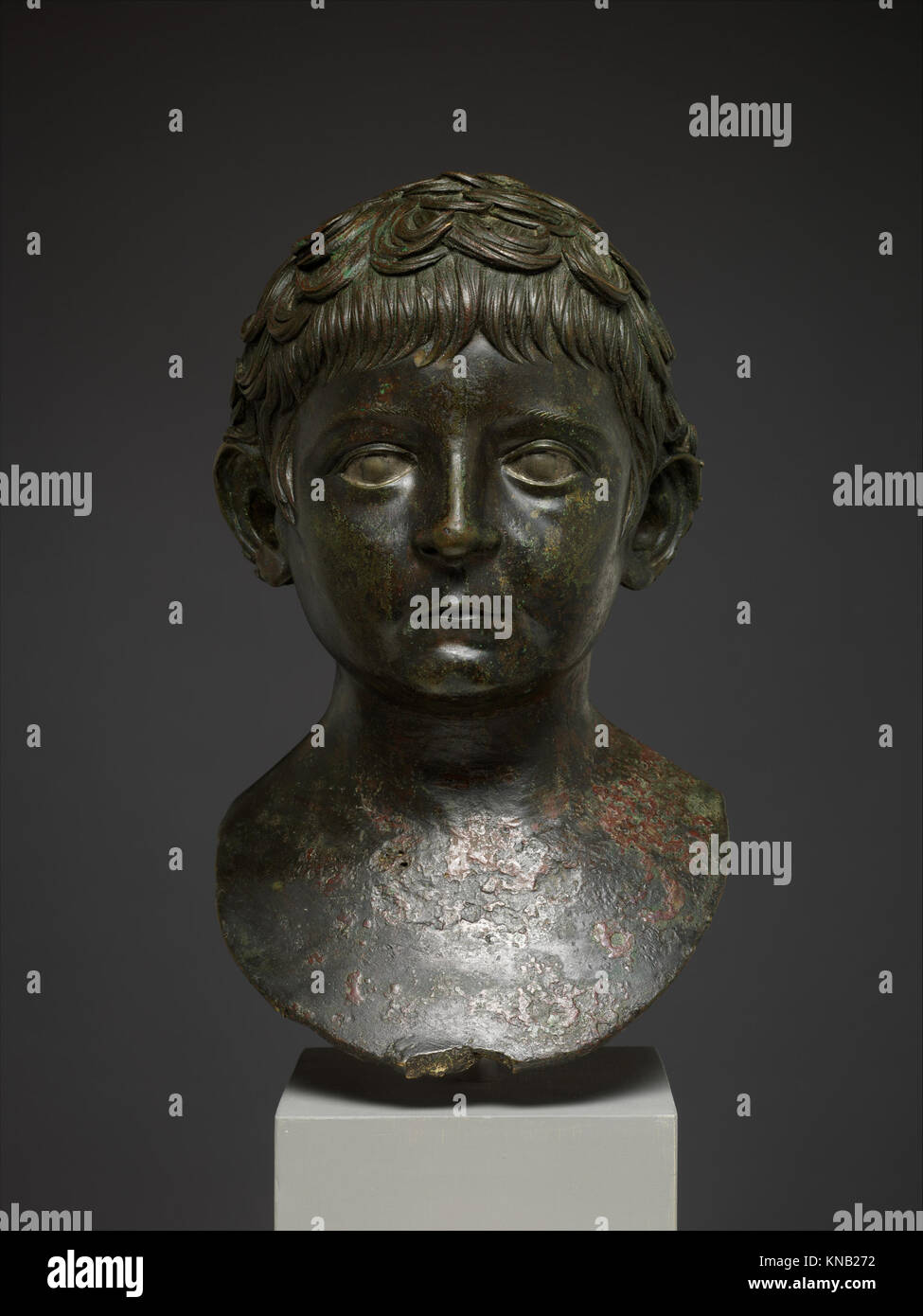 A Roman bronze portrait bust of a young boy from the 1st century ...