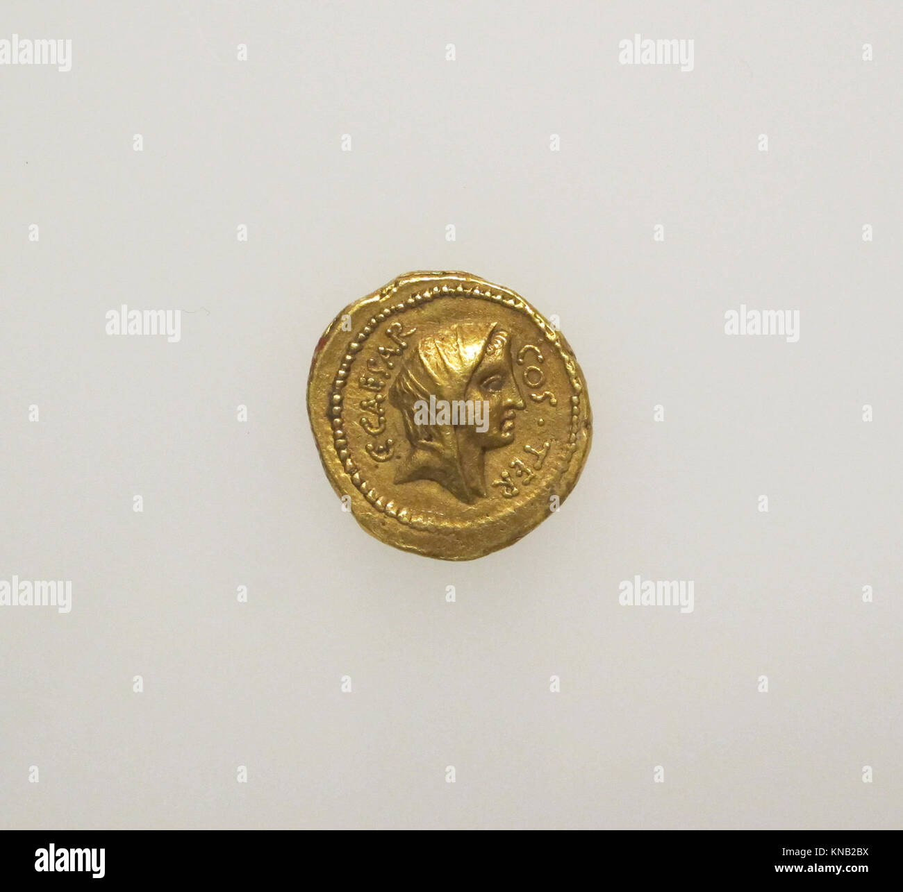 A gold aureus coin featuring Julius Caesar, representing Roman imperial ...