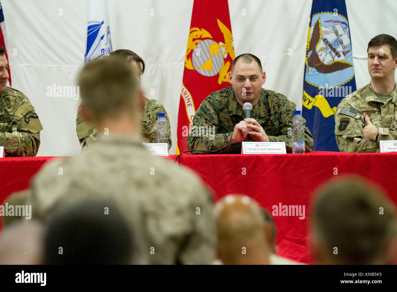 Corporal Matt Bradford, retired Marine Corps infantryman, answers a ...