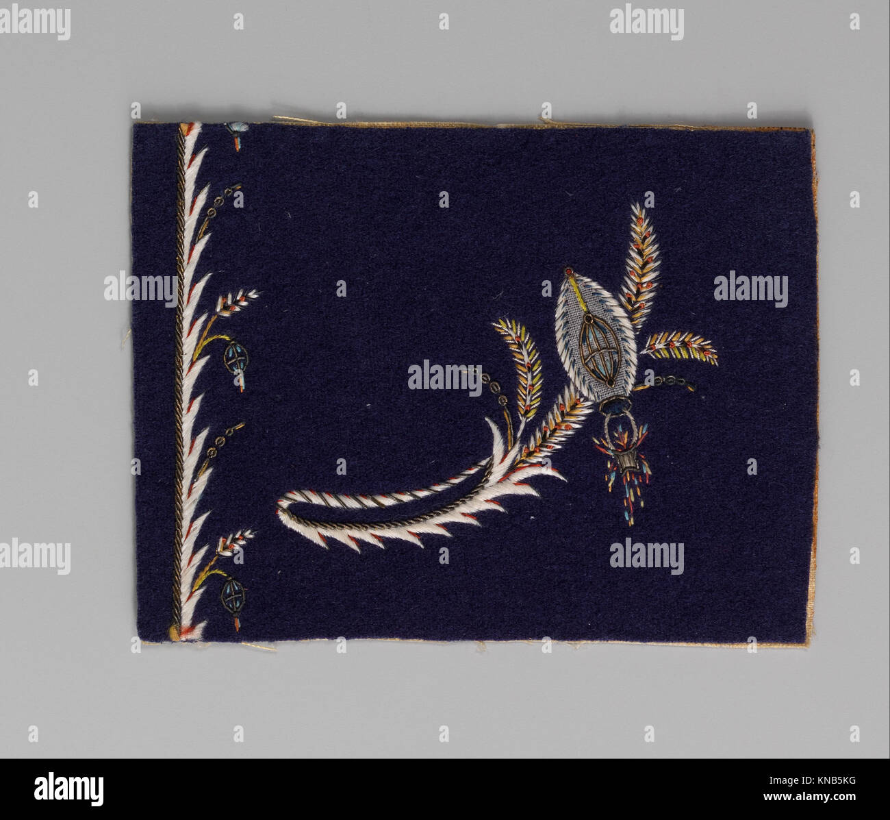 This embroidery sample, intended for a man's suit, showcases intricate ...