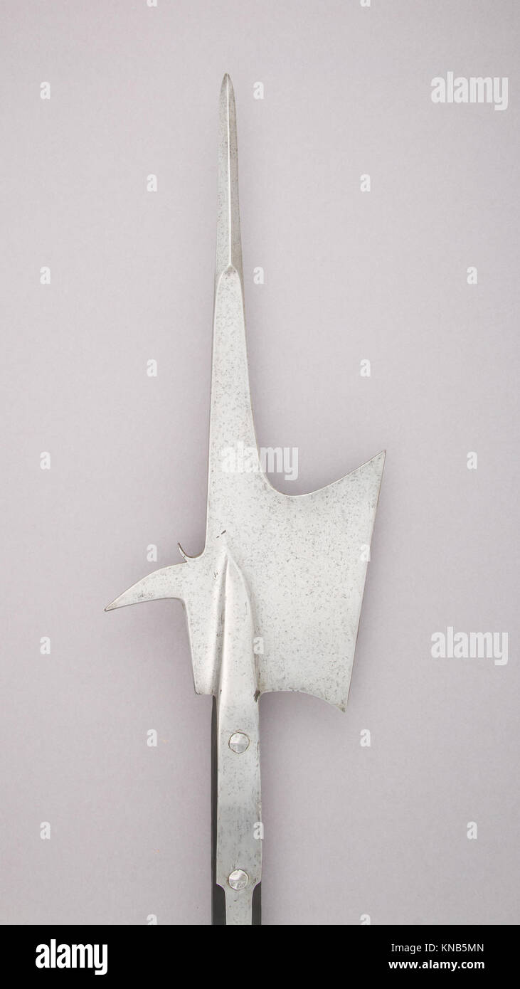 This halberd is a pole weapon featuring an axe blade, spear point, and ...