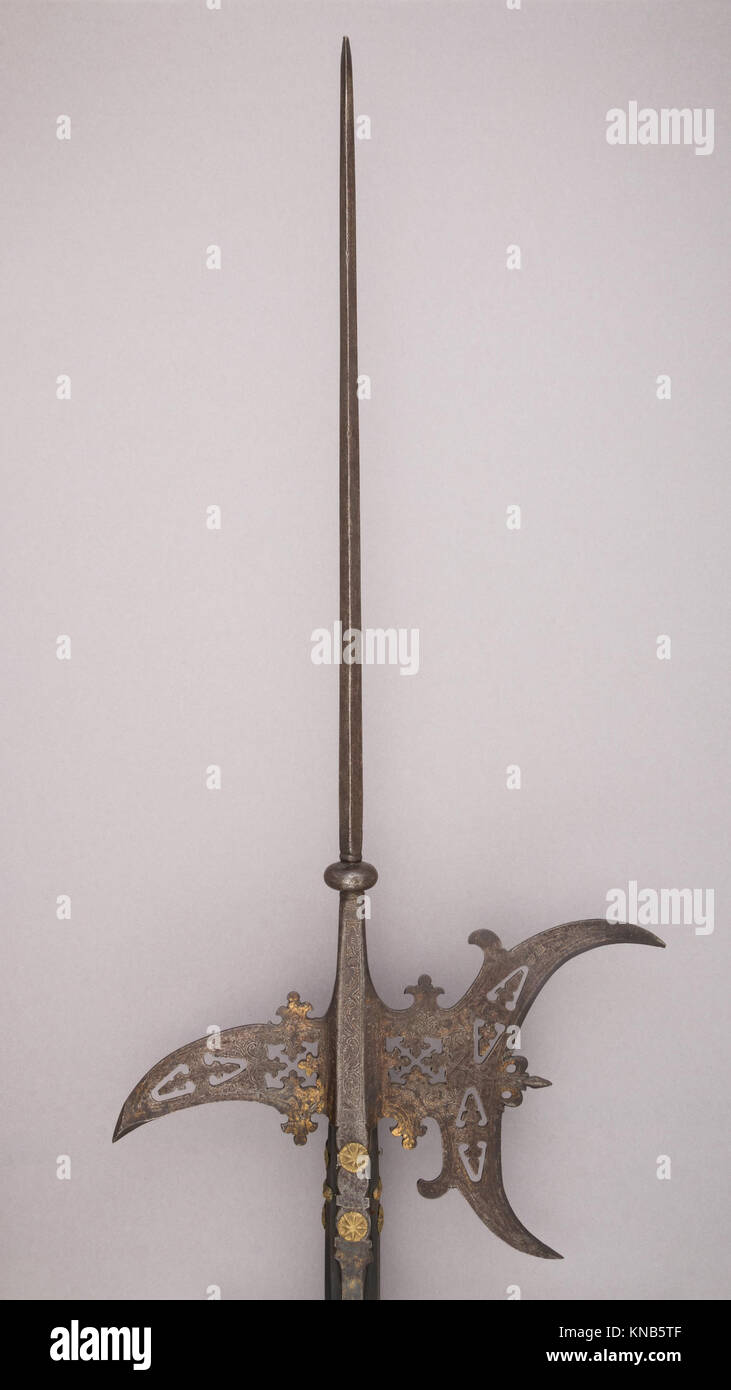 This halberd, a type of medieval weapon, features a combination of an ...