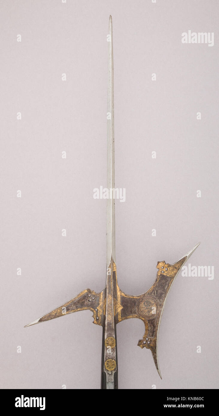 This halberd is a weapon from the medieval period, showcasing a ...