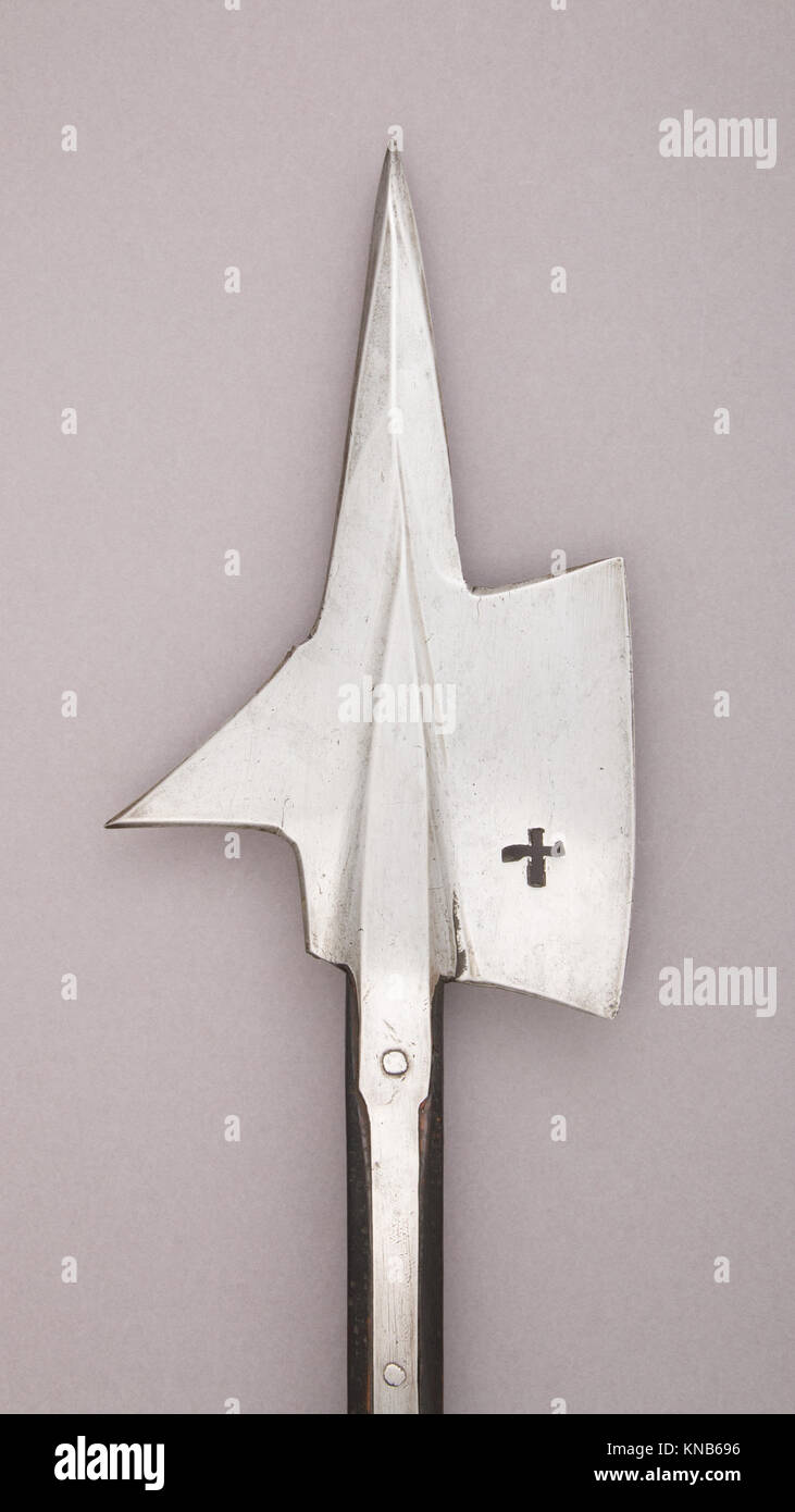 This halberd is a weapon from the medieval period, showcasing both the ...