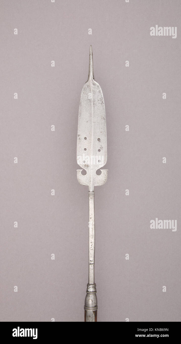 This halberd, a type of pole weapon from the medieval period, combines ...