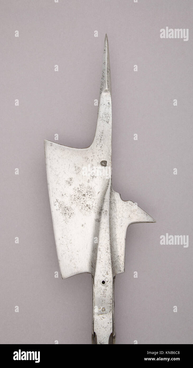 This medieval halberd combines axe, spear, and hook, serving in combat ...