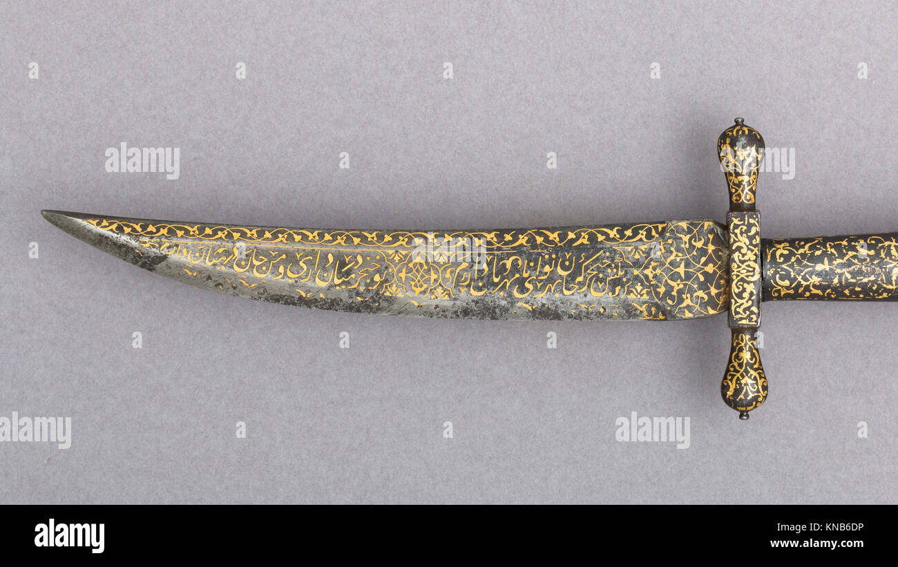 The dagger with sheath is a weapon and decorative object, combining ...