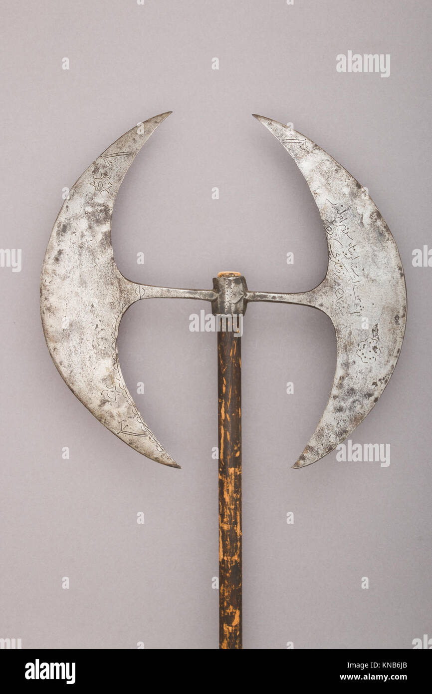 This double-bladed processional axe is a ceremonial weapon, likely used ...