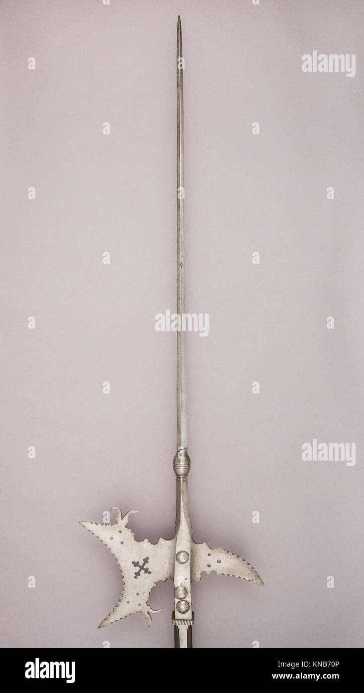 This medieval halberd is a pole weapon featuring a spear tip and axe ...