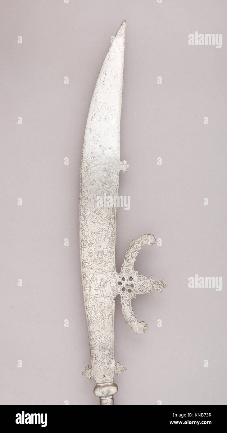 The Fauchard is a medieval polearm with a curved blade and long wooden ...