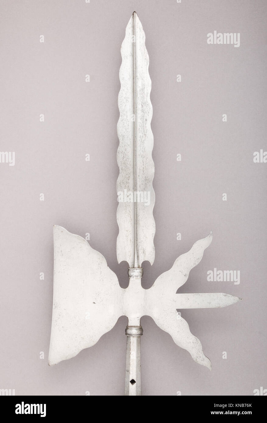 This halberd, carried by the Swiss Guard during the reign of Louis XIV ...