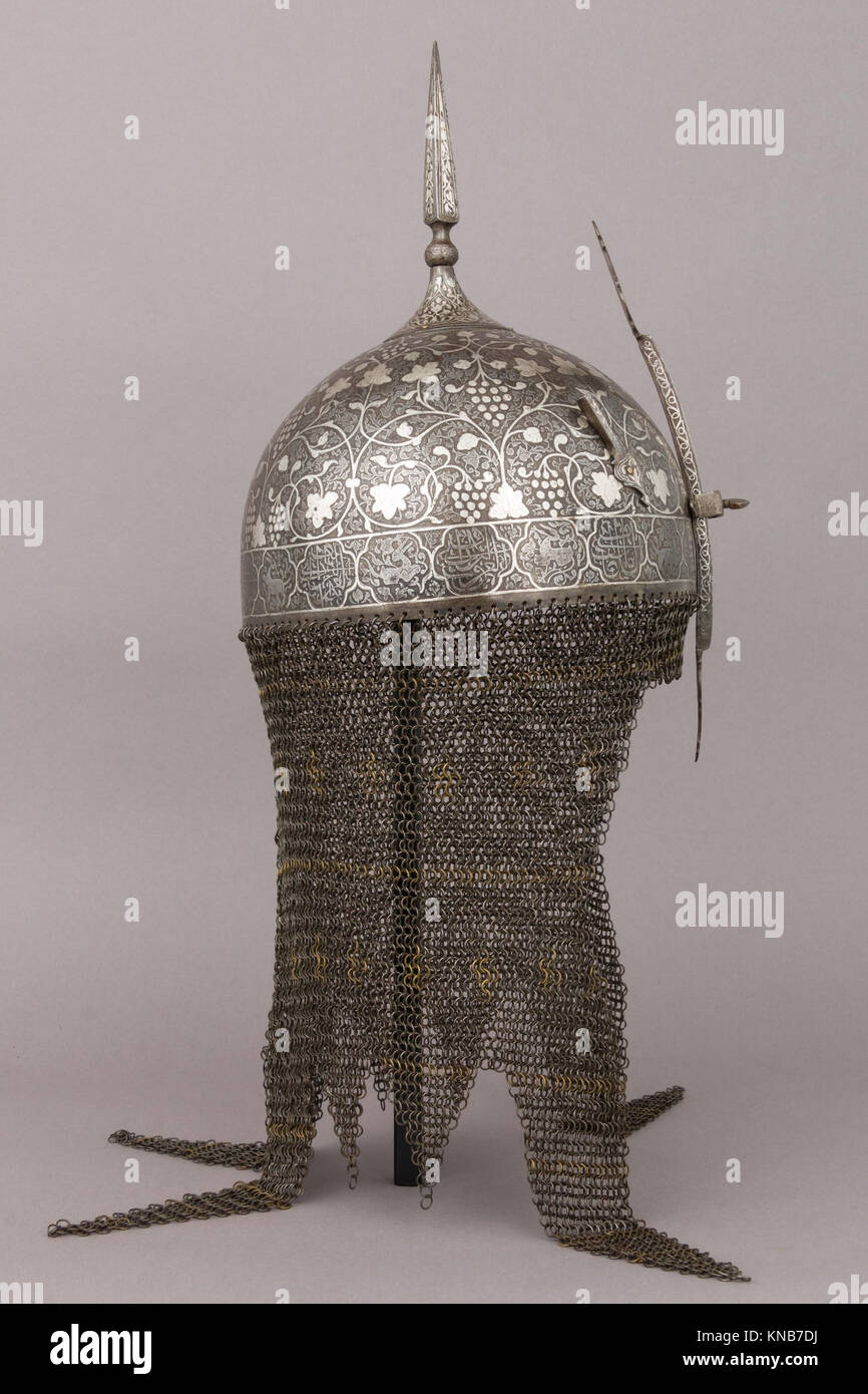 A set of medieval armor components, including a helmet, arm guard, and ...