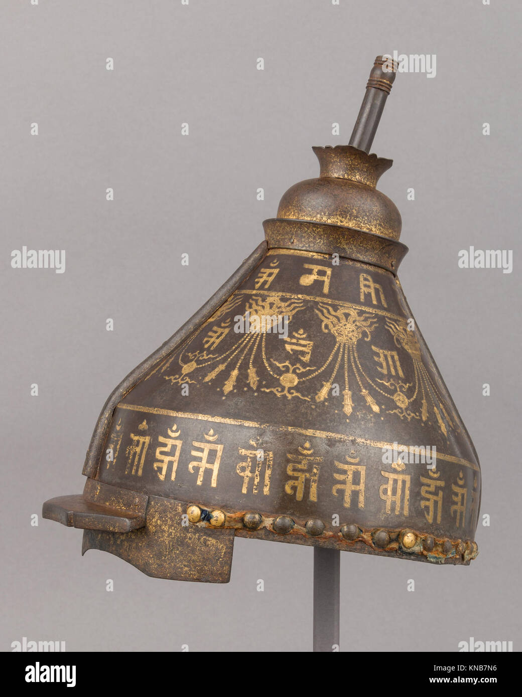 An ancient helmet designed for military or ceremonial use, exemplifying ...