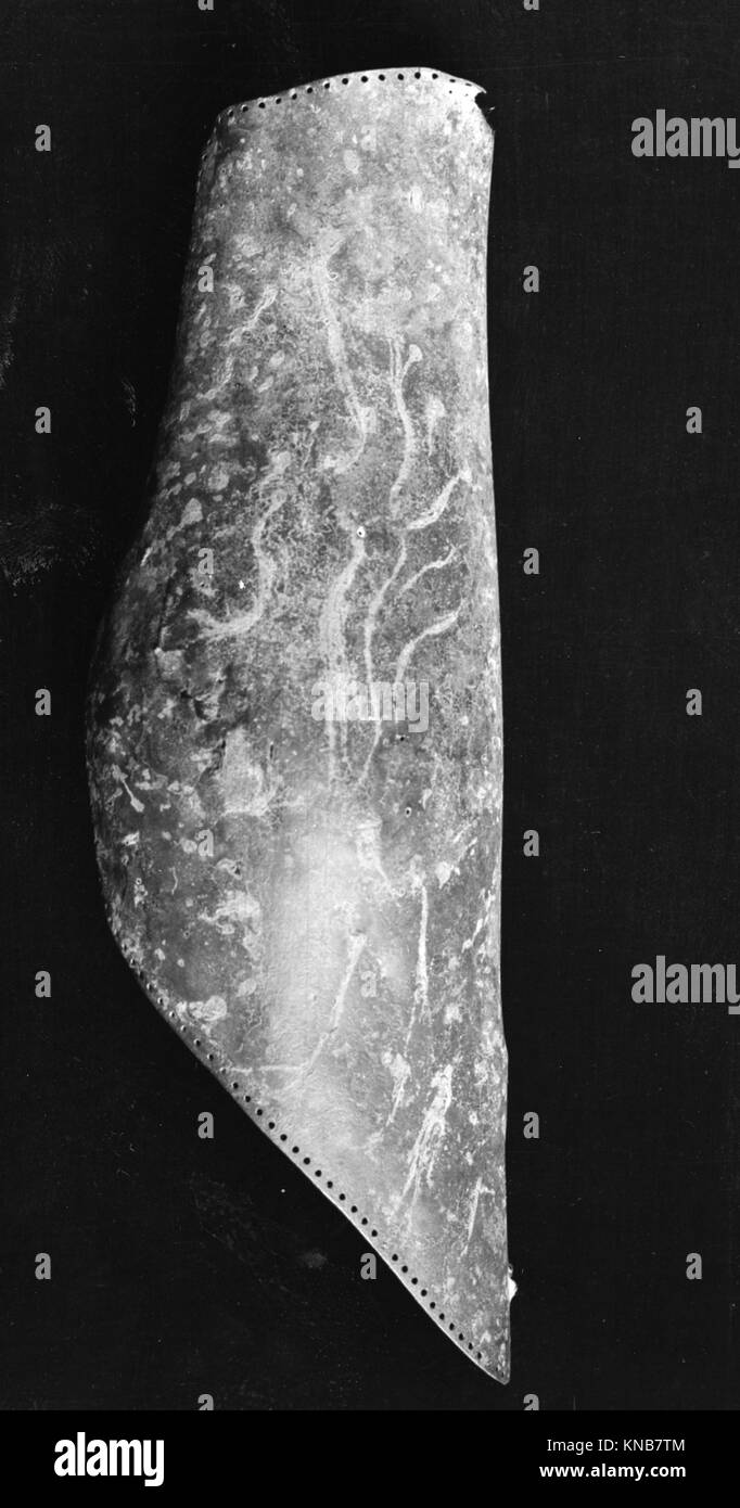 This bronze greave is an ancient Greek defensive armor piece for the ...