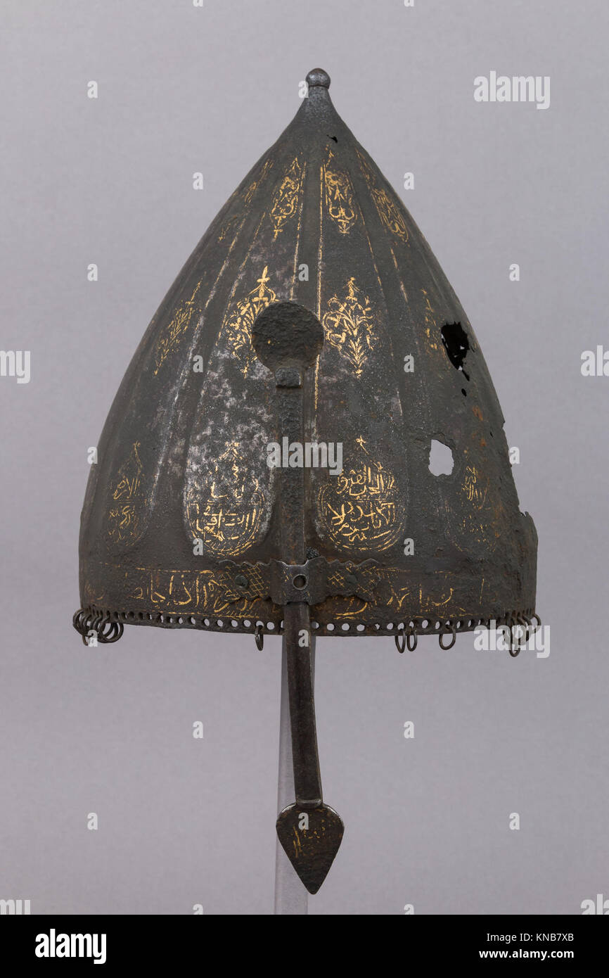 This helmet is a fine example of historical armor, featuring intricate ...