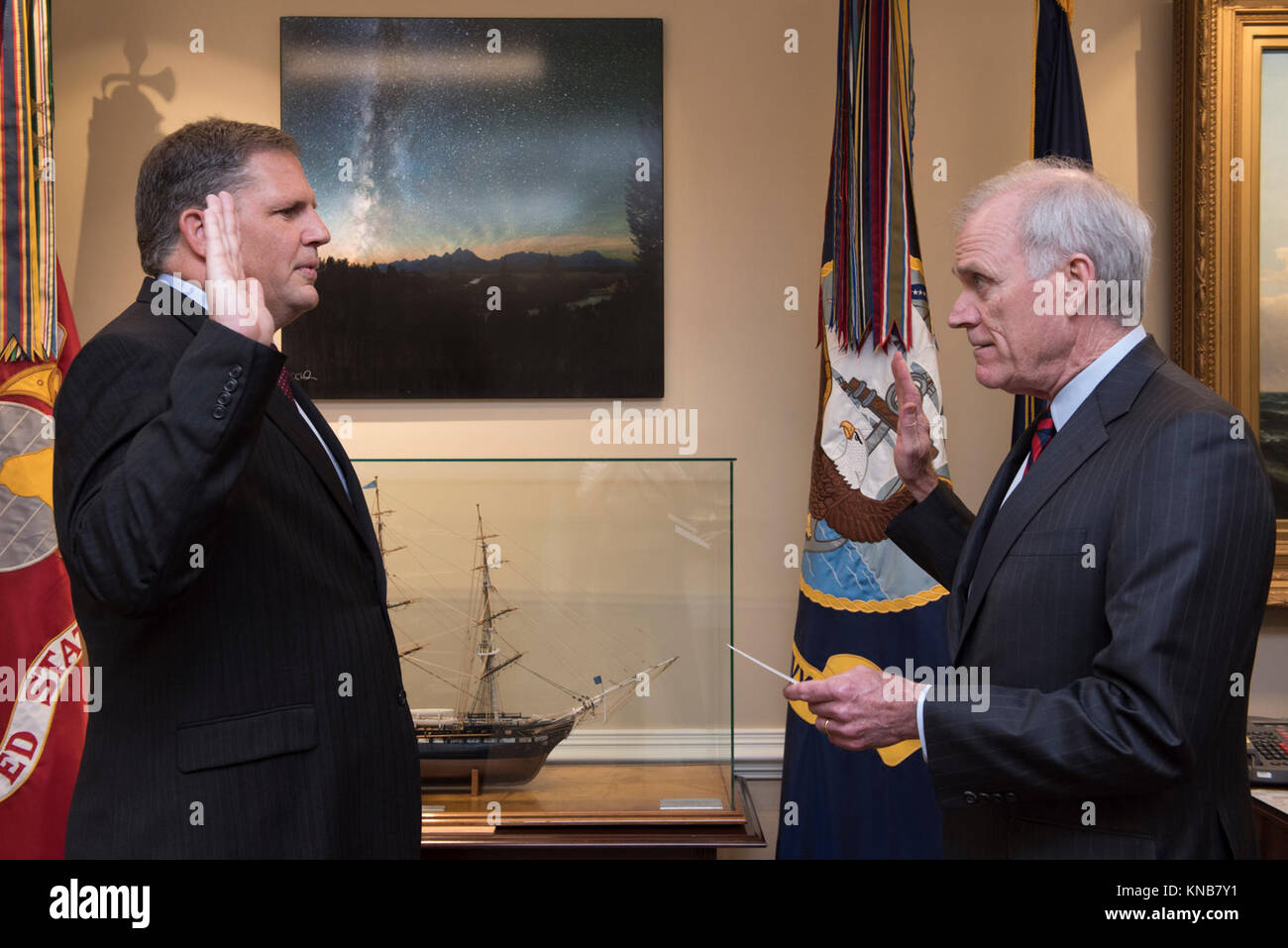 James F. Geurts, left, is formally sworn in as assistant secretary of the Navy for research ...