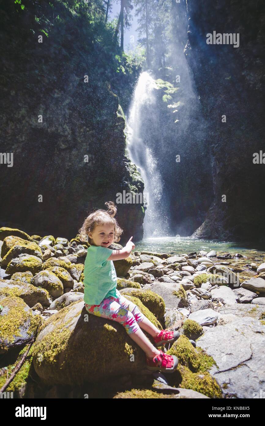 Girl under waterfall hi-res stock photography and images - Alamy