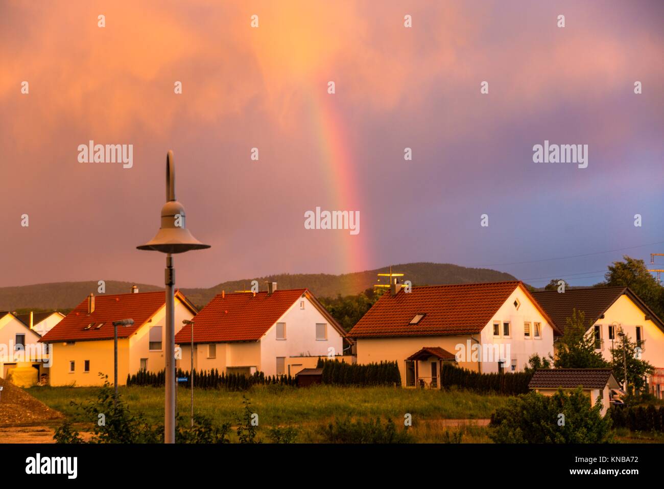 rainbow in the city Germany Stock Photo - Alamy