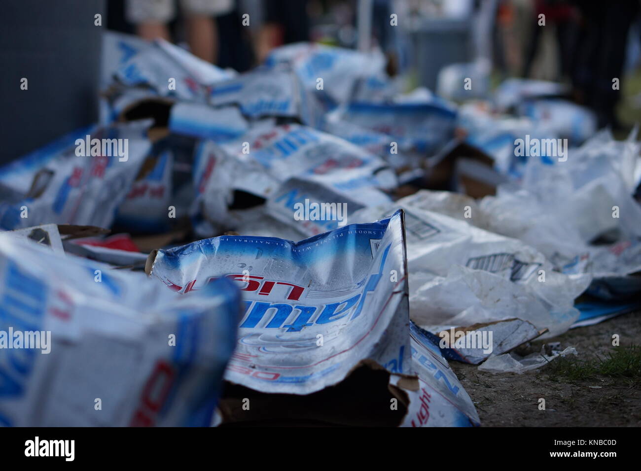 Natural Light beer boxes litter the ground Stock Photo - Alamy