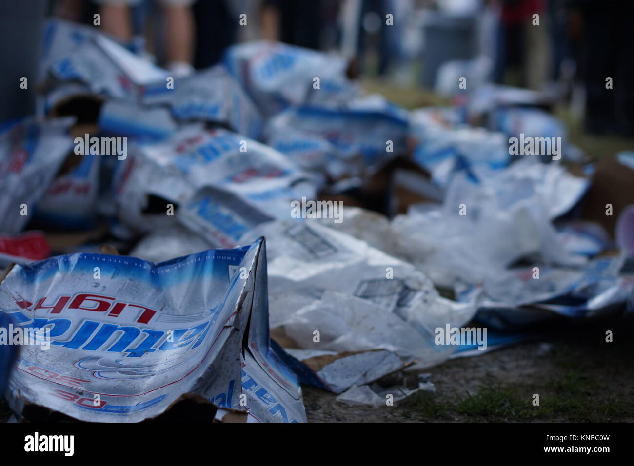 Natural Light beer boxes litter the ground Stock Photo - Alamy