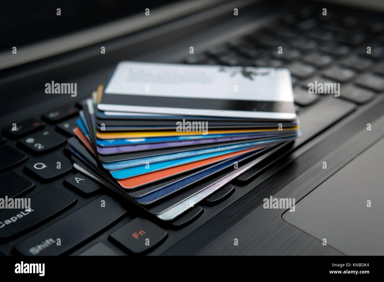 Laptop keyboard credit cards hi-res stock photography and images - Alamy
