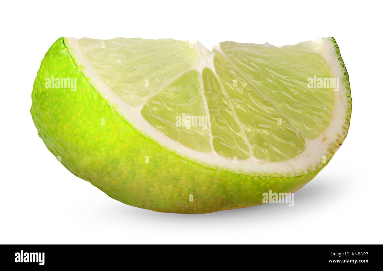Small piece of lime isolated on white background Stock Photo - Alamy